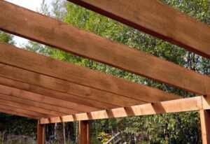 start building a porch roof attached to your house.